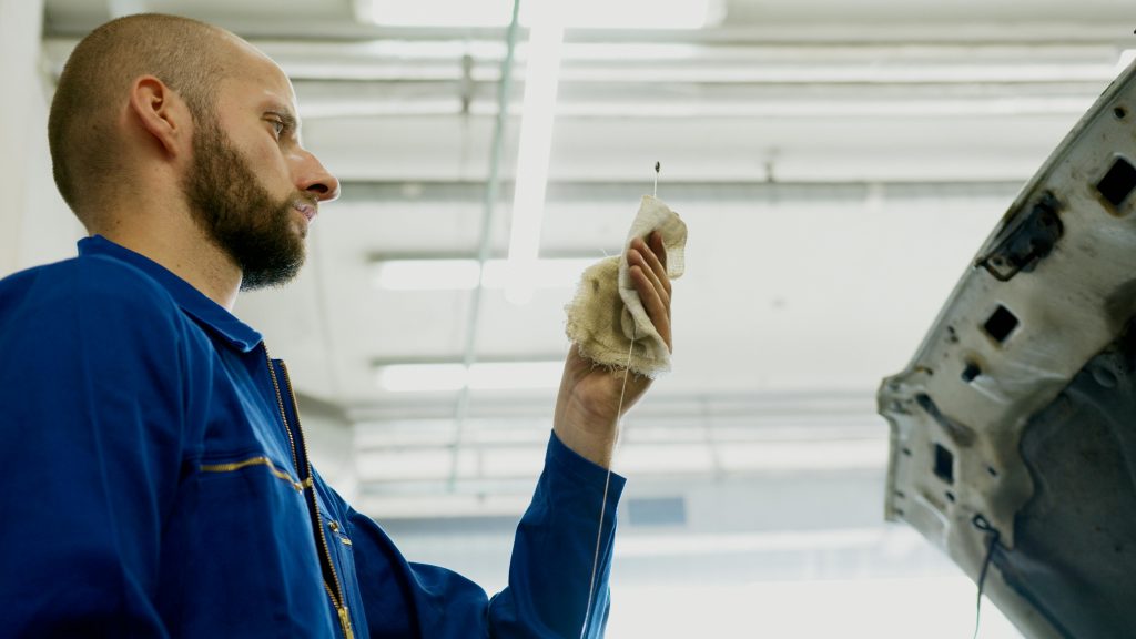How to Read an Oil Dipstick: Check Oil Level & Condition